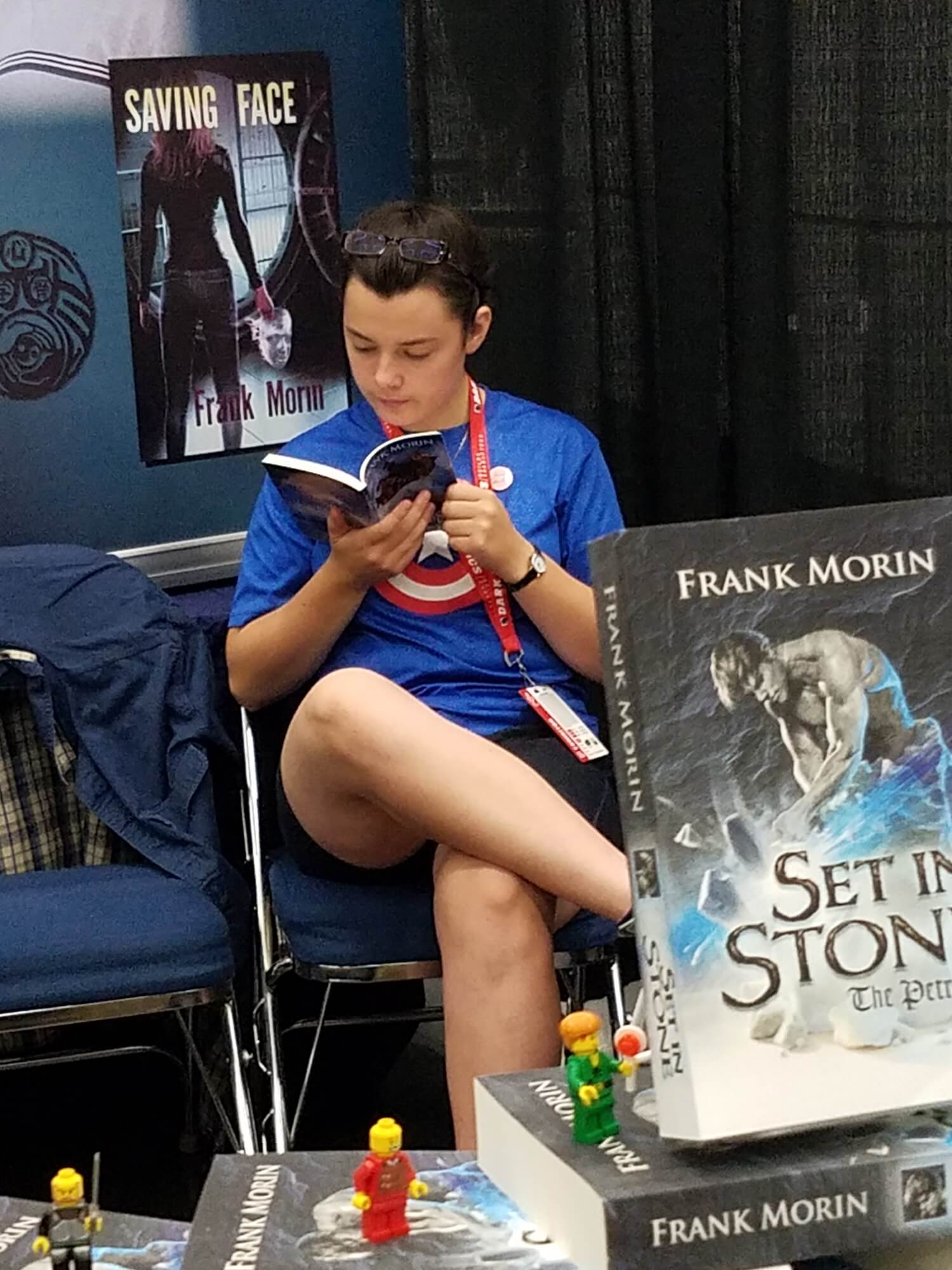 Emily reading When Torcs Fly • Frank Morin